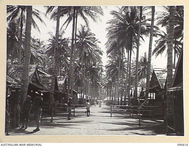 DAEO, MOROTAI. APRIL 1945. THE MAIN STREET OF THE NEW SECTION OF THE ...