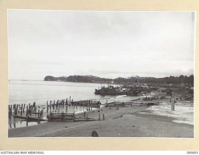 AITAPE, NEW GUINEA. 1945-04-19. SUPPLIES BEING UNLOADED FROM BARGES AT ...