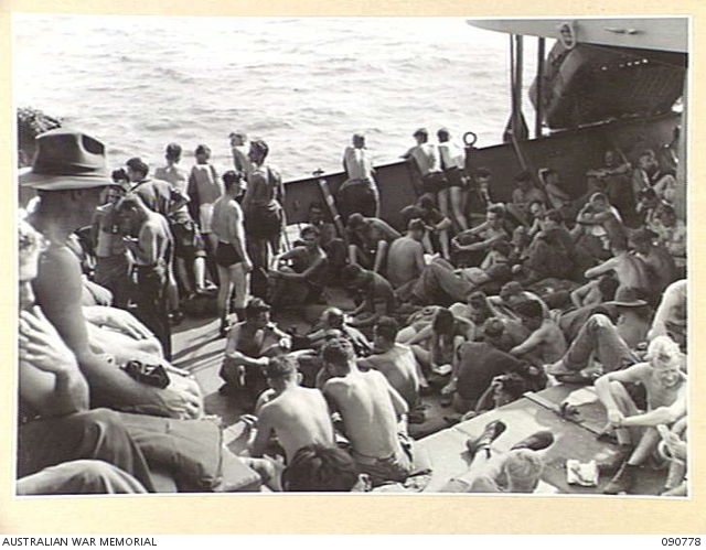 AT SEA, TOWNSVILLE-MOROTAI. 1945-04-15. MEN OF HEADQUARTERS 1 CORPS ...