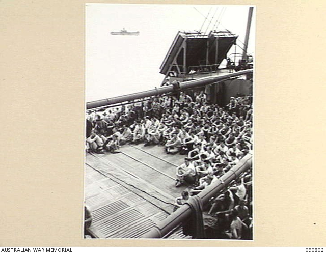 AT SEA, TOWNSVILLE - MOROTAI. 1945-04-15. TROOPS ATTENDING THE MEMORIAL ...
