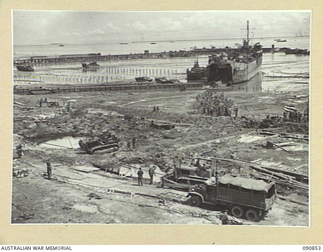 TARAKAN, BORNEO. 1945-05-01. LANDING SHIP, TANK (LST) HIGH AND DRY AT ...