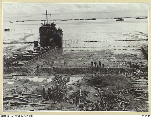 TARAKAN, BORNEO. 1945-05-01. LANDING SHIP, TANK (LST) HIGH AND DRY AT ...