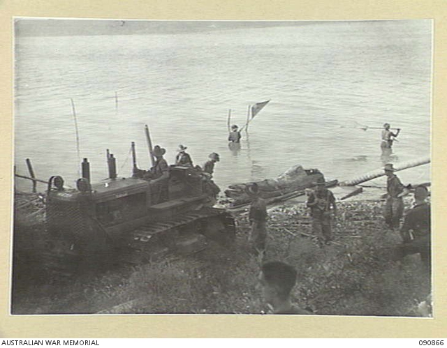 SADAU ISLAND, BORNEO. 1945-04-30. A BULLDOZER FROM 2 MECHANICAL ...