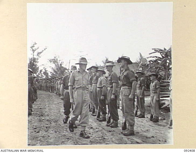 MOROTAI, 1945-05-19. LT J. MUDDLE, ASSISTANT CAMP COMMANDANT (1), WITH ...