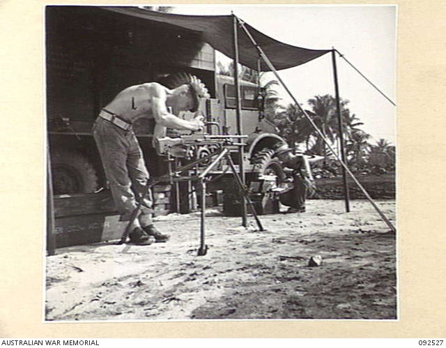 MOROTAI. 1945-05-20. CRAFTSMAN A.A. HUNT, ARMOURER, 319 LIGHT AID ...