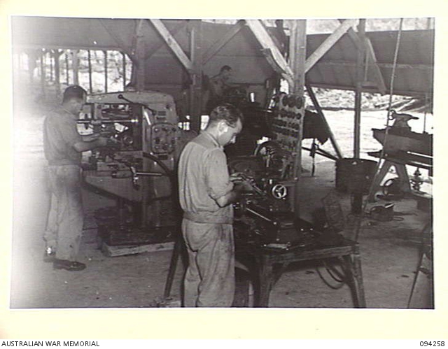 PALMALMAL PLANTATION, NEW BRITAIN. 1945-07-21. THE TURNING AND FITTING ...