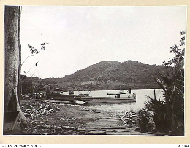 NANTAMBU, NEW BRITAIN. 1945-07-26. THE BEACH HEAD WITH BARGES FROM A ...