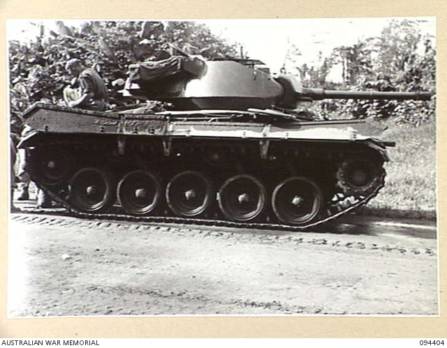TOROKINA AREA, BOUGAINVILLE. 1945-07-23. AN M24 GENERAL CHAFFEE LIGHT ...