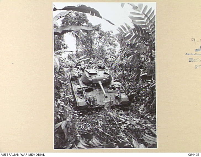 TOROKINA AREA, BOUGAINVILLE. 1945-07-28. AN M24 GENERAL CHAFFEE LIGHT ...