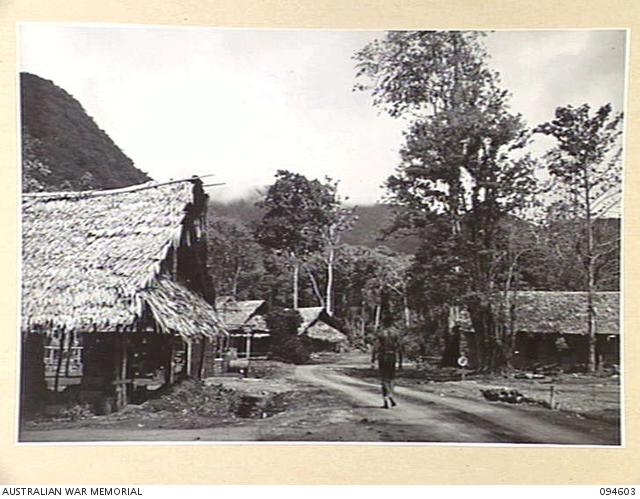 NANTAMBU, NEW BRITAIN, 1945-07-26. SCENE ON ROAD NEAR BATTALION ...