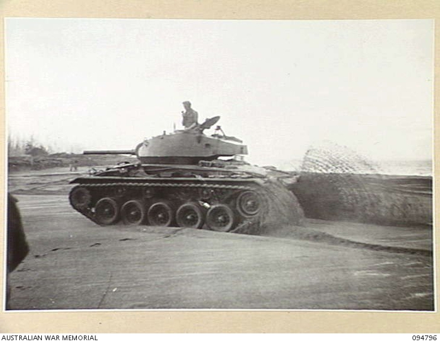TOROKINA AREA, BOUGAINVILLE, 1945-08-06. AN M24 GENERAL CHAFFEE LIGHT ...