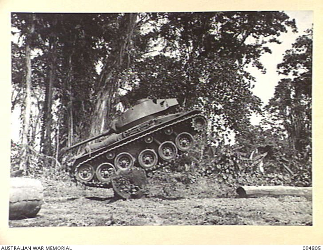 TOROKINA AREA, BOUGAINVILLE, 1945-08-08. AN M24 GENERAL CHAFFEE LIGHT ...