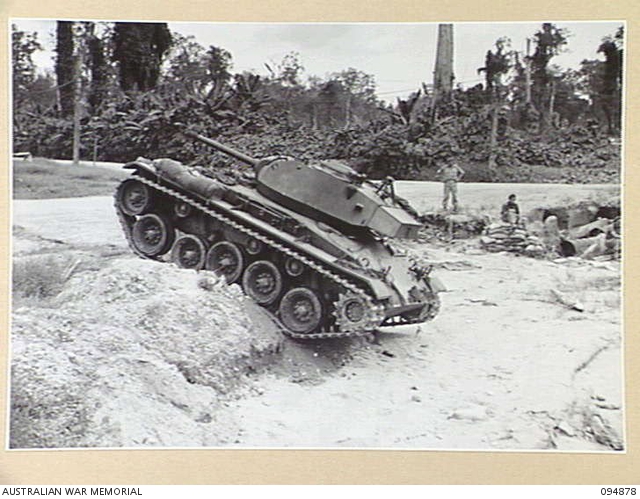 TOROKINA AREA, BOUGAINVILLE. 1945-08-08. AN M24 GENERAL CHAFFEE LIGHT ...