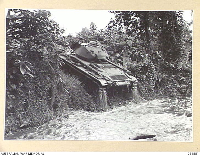 TOROKINA AREA, BOUGAINVILLE. 1945-08-08. AN M24 GENERAL CHAFFEE LIGHT ...