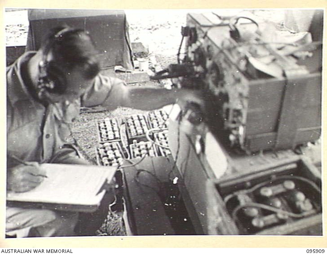WEWAK POINT, NEW GUINEA. 1945-08-29. SIGNALMAN J. BROGEN, 19 INFANTRY ...