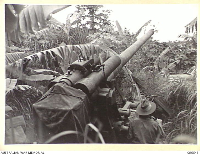 RABAUL, NEW BRITAIN. 1945-09-14. A JAPANESE 105MM ANTI-AIRCRAFT GUN ...