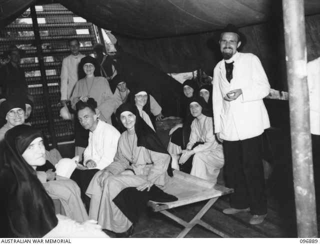 Vunapope, New Britain. Sisters and Priests aboard the Army barge on ...