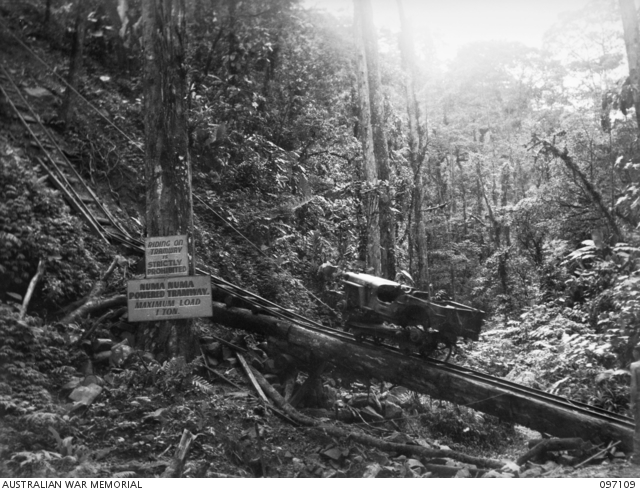 BOUGAINVILLE. 1945-09-26. A JEEP COMES DOWN FROM THE NUMA NUMA TRAIL ON ...