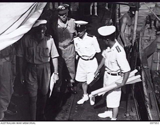OCEAN ISLAND. 1945-09-30. THE JAPANESE ENVOY GOING ABOARD HMAS ...