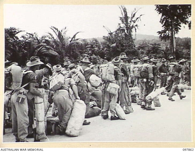 BORAM BEACH, NEW GUINEA. 1945-10-13. TROOPS OF 6 DIVISION, WITH THEIR ...