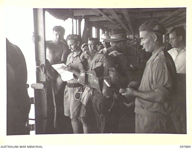 OFF BORAM BEACH, NEW GUINEA. 1945-10-13. THE FIRST BATCH OF TROOPS TO ...