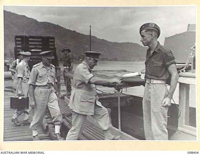 RABAUL, NEW BRITAIN. 1945-10-28. FOLLOWING INSPECTION OF A CEREMONIAL ...