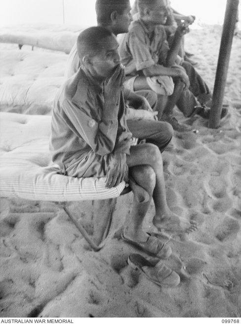 BORAM BEACH, NEW GUINEA, 1945-10-14. ELEVEN INDIAN SOLDIERS WERE ...