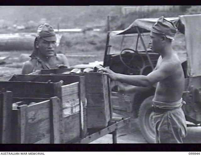 RABAUL, NEW BRITAIN, 1946-03-29. JAPANESE LABOURERS LOADING DIRTY ...