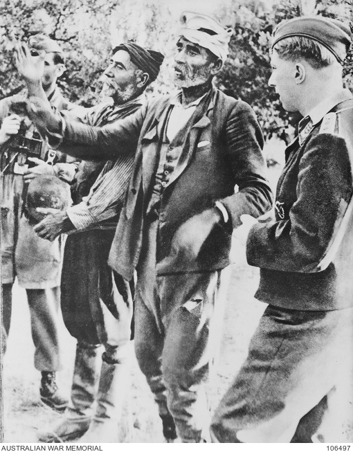 Crete. c.1941-05. German soldiers interrogating elderly local men ...