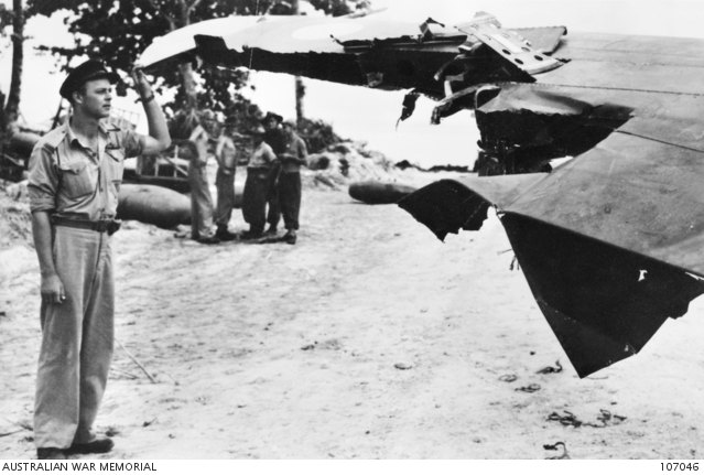 NOEMFOOR ISLAND, 1944-08-09. WITH THE PORT AILERON TORN COMPLETELY AWAY ...