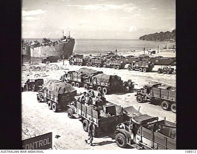 MOROTAI, 1945-05-30. A GENERAL VIEW OF VEHICLES AT THE EMBARKATION AREA ...