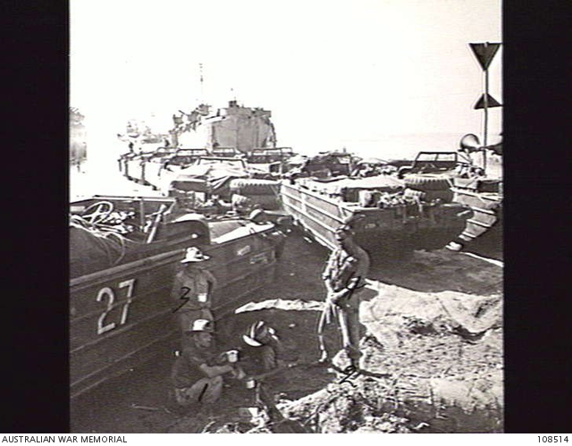 MOROTAI, 1945-05-30. MEMBERS OF 2/19TH TRANSPORT PLATOON DRINKING TEA ...