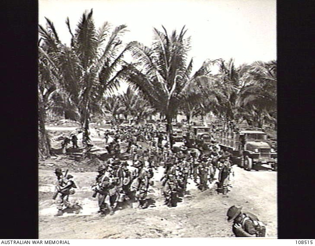 MOROTAI, 1945-05-30. UNIDENTIFIED MEMBERS OF 2/32ND INFANTRY BATTALION ...