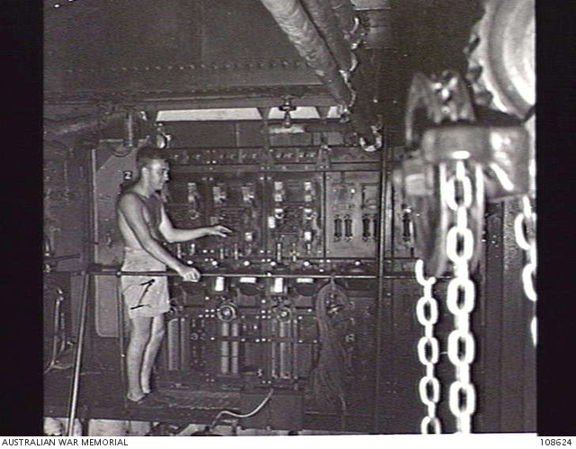 AT SEA, 1945-05-19. MAIN SWITCHBOARD AND GENERAL VIEW OF THE ENGINE ...