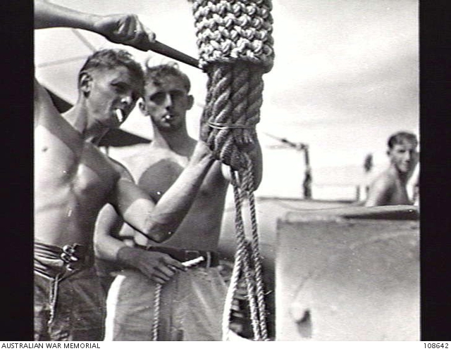 AT SEA, 1945-05-22. LEADING SEAMAN R. RIDEOUT (1) AND ORDINARY SEAMAN W ...