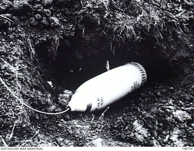 BROADMEADOWS, VIC, 1945-06-12. A US ARMY SHELL READY FOR DESTRUCTION BY ...