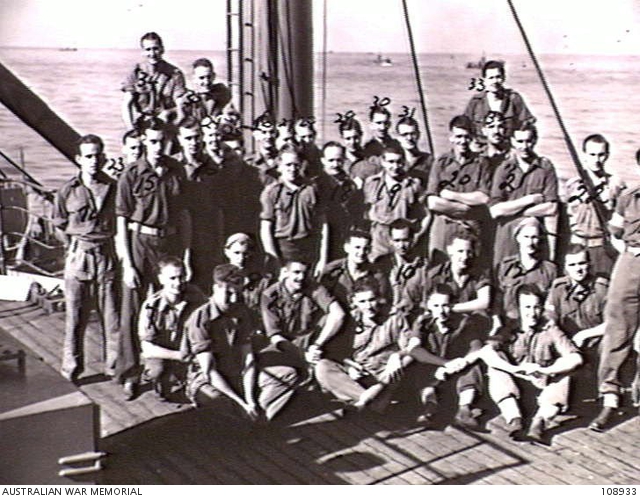 AT SEA, 9 JUNE 1945. MEMBERS OF 2 LANDING SHIP DETACHMENT, ABOARD HMAS ...