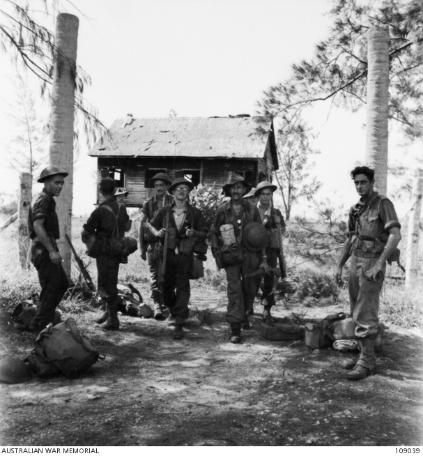 LABUAN, NORTH BORNEO, 1945-06-10. A NATIVE HOUSE NOW OCCUPIED BY TROOPS ...