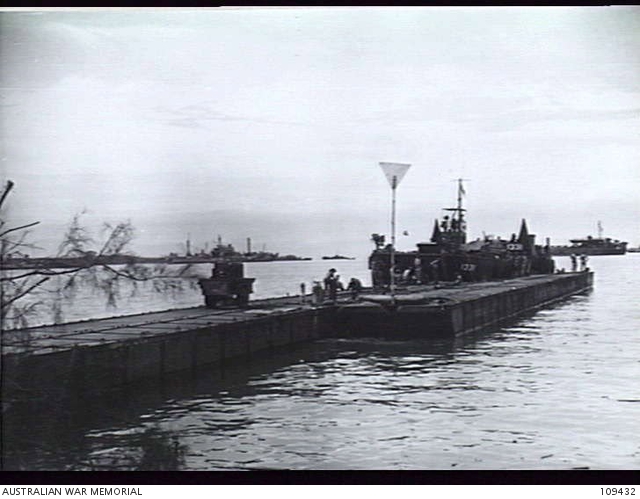 LABUAN ISLAND. 14 JUNE 1945. THE NAVAL LIGHTERAGE PONTOON JETTY ON ...