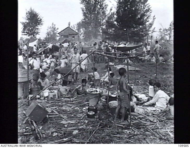 LABUAN ISLAND. 14 JUNE 1945. A SECTION OF THE BRITISH BORNEO CIVIL ...
