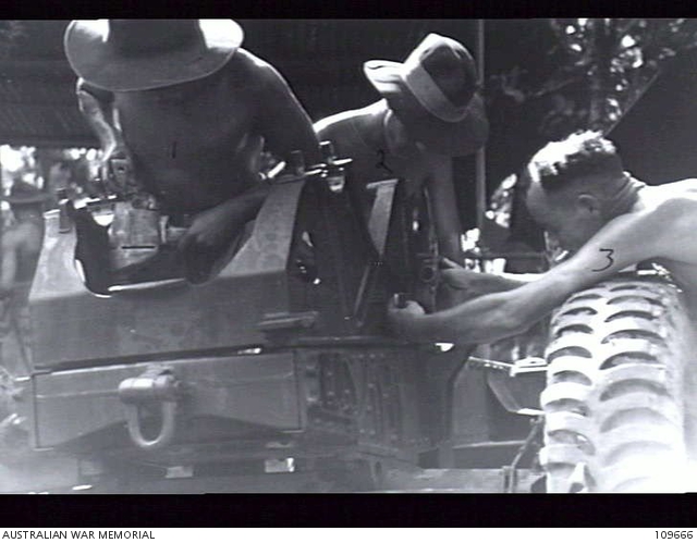 TARAKAN ISLAND. 19 JUNE 1945. CRAFTSMAN A MIGLIONICO (1) STAFF-SERGEANT ...
