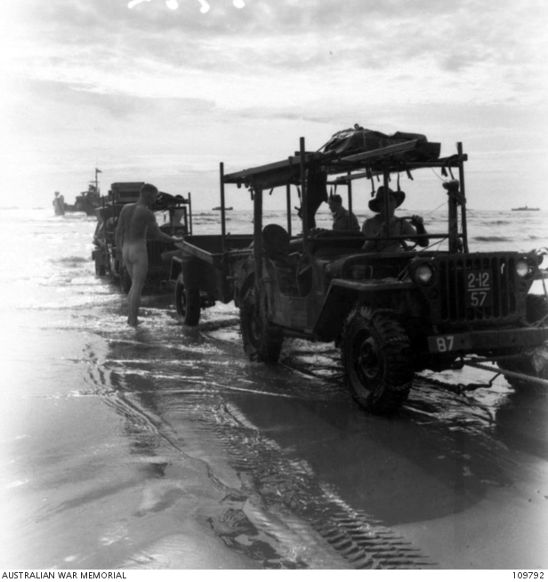LUTONG, BORNEO, 1945-06-20. TROOPS OF 2/13 INFANTRY BATTALION LANDED AT ...