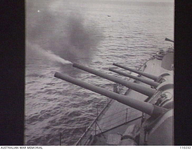 BRUNEI BAY AREA. 10 JUNE 1945. THE 6-INCH GUNS OF THE RAN CRUISER, HMAS ...