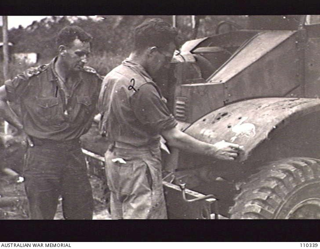 SERIA, BORNEO. 28 JUNE 1945. AFTER CAPTURE OF THE AREA MEMBERS OF 2/58 ...