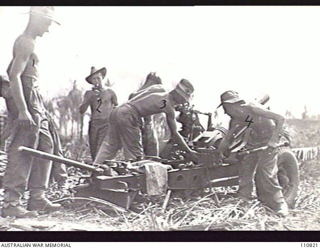 BALIKPAPAN, BORNEO. 1 JULY 1945. MEMBERS OF C TROOP, 2/4 FIELD REGIMENT ...