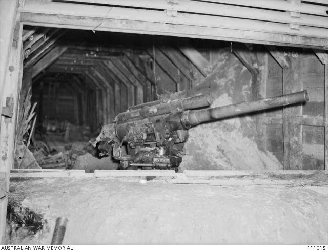 BALIKPAPAN AREA, BORNEO. 6 JULY 1945. A JAPANESE 6 INCH NAVAL GUN ON ...