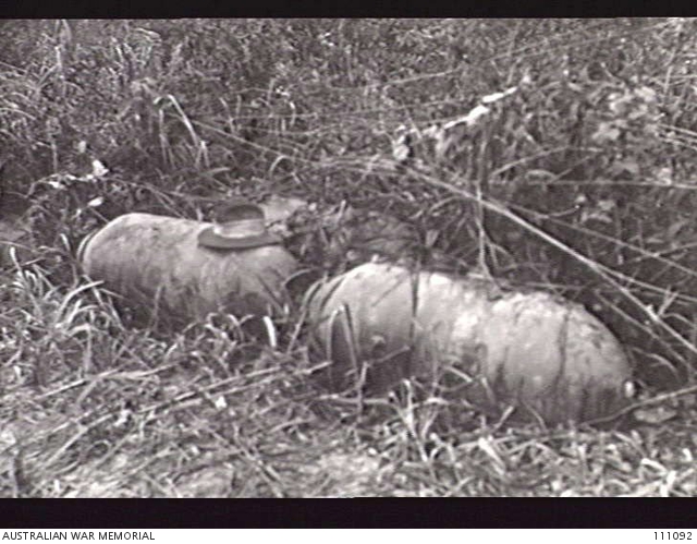 BALIKPAPAN, BORNEO. 11 JULY 1945. JAPANESE 1000-POUND AERIAL BOMBS ...