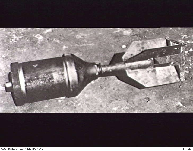 MELBOURNE, VICTORIA, 29 JULY 1945. A JAPANESE ROCKET MOTOR WITH TAIL ...