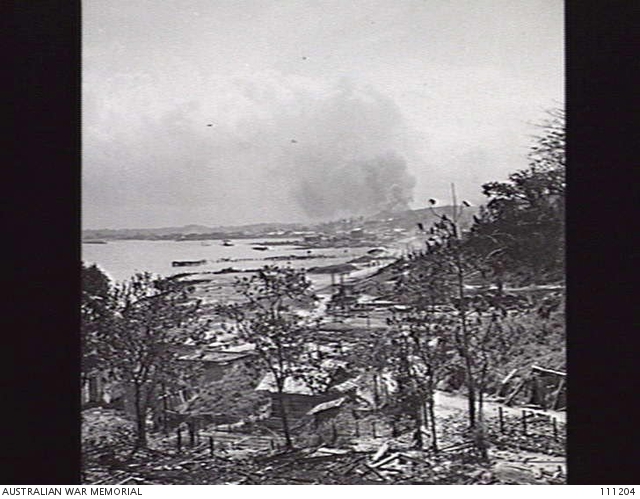 BALIKPAPAN, BORNEO, 3 JULY 1945. VIEW OF BALIKPAPAN TOWN, TAKEN FROM ...