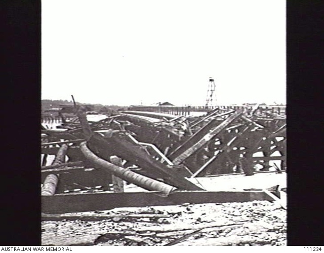 MANGGAR, BORNEO, 5 JULY 1945. THE MAIN BRIDGE OVER THE MANGGAR RIVER IN ...